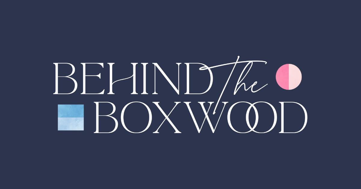 Behind the Boxwood